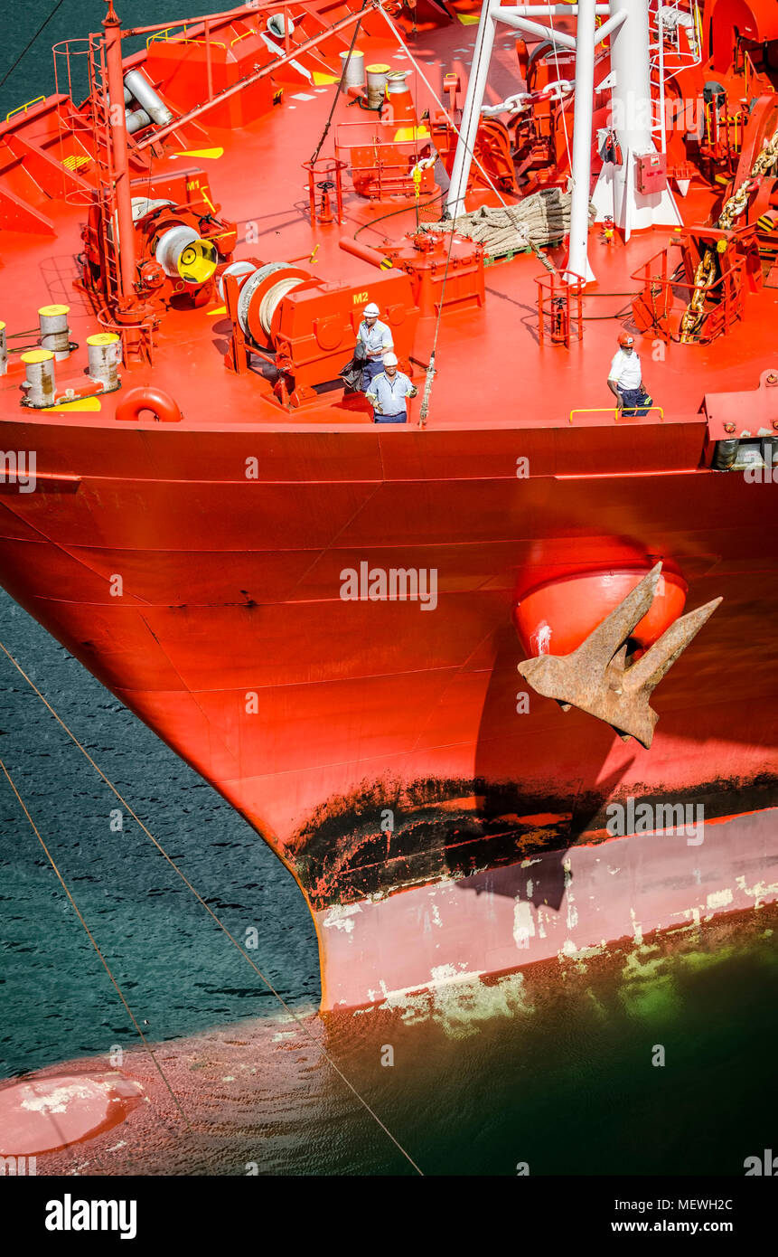 Red Tankship prow detail with crew at work Stock Photo - Alamy