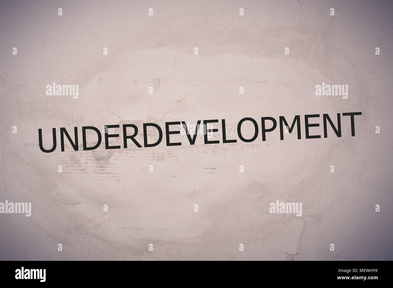 underdevelopment word written on white background Stock Photo - Alamy