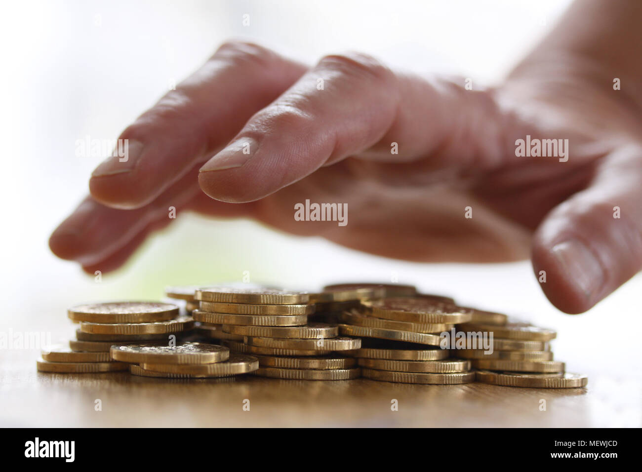 Hand grabbing money hi-res stock photography and images - Alamy