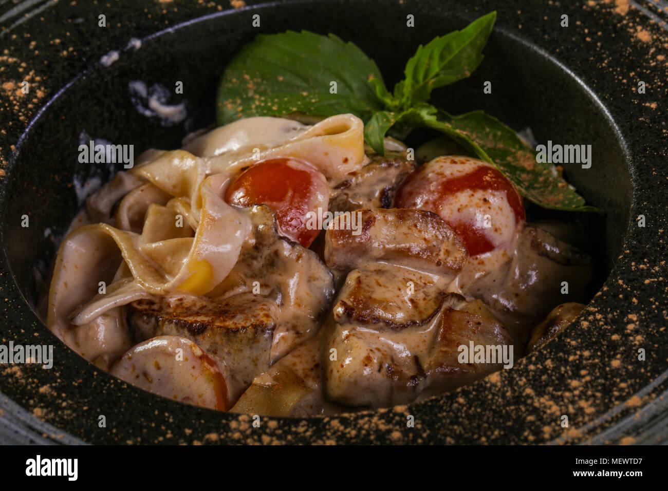 Delicous pasta with mushroom served basil Stock Photo - Alamy