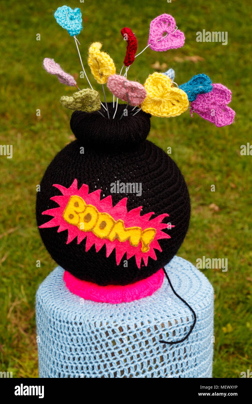 Knitted bomb with exploding hearts on display at Yarndale, Skipton ...