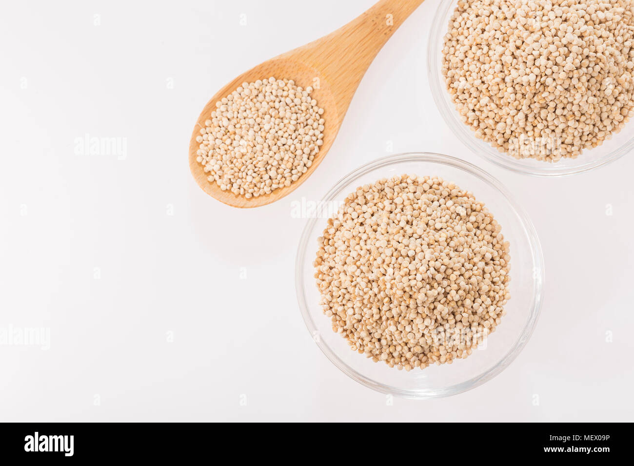 Quinoa grains in bowl isolated on white background, Chenopodium quinoa ...