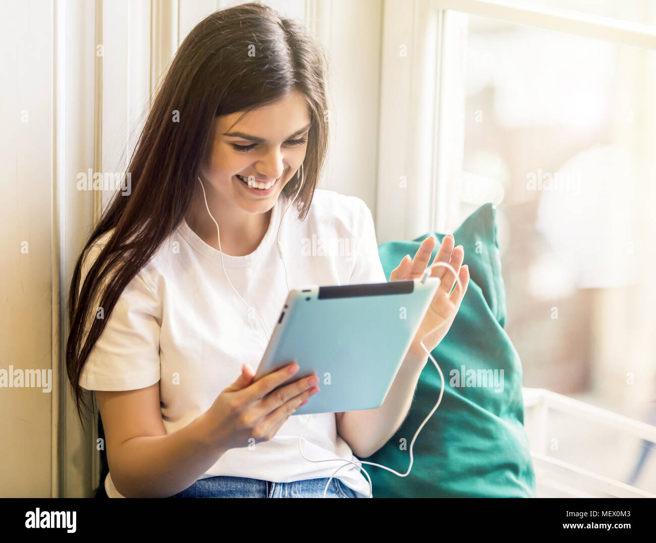 Talking via Tablet Stock Photo - Alamy