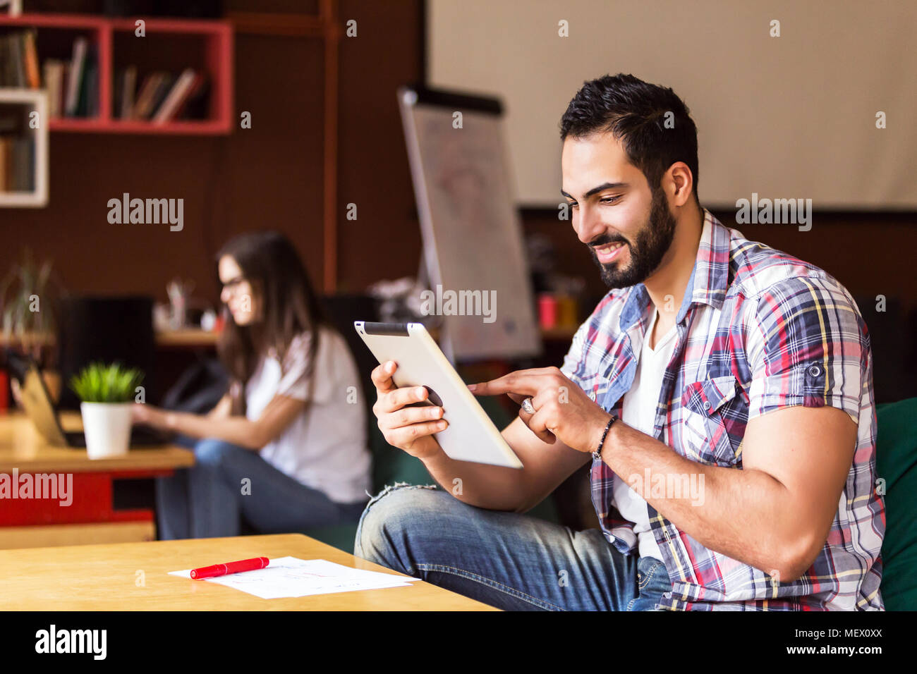 Using the Tablet Stock Photo - Alamy