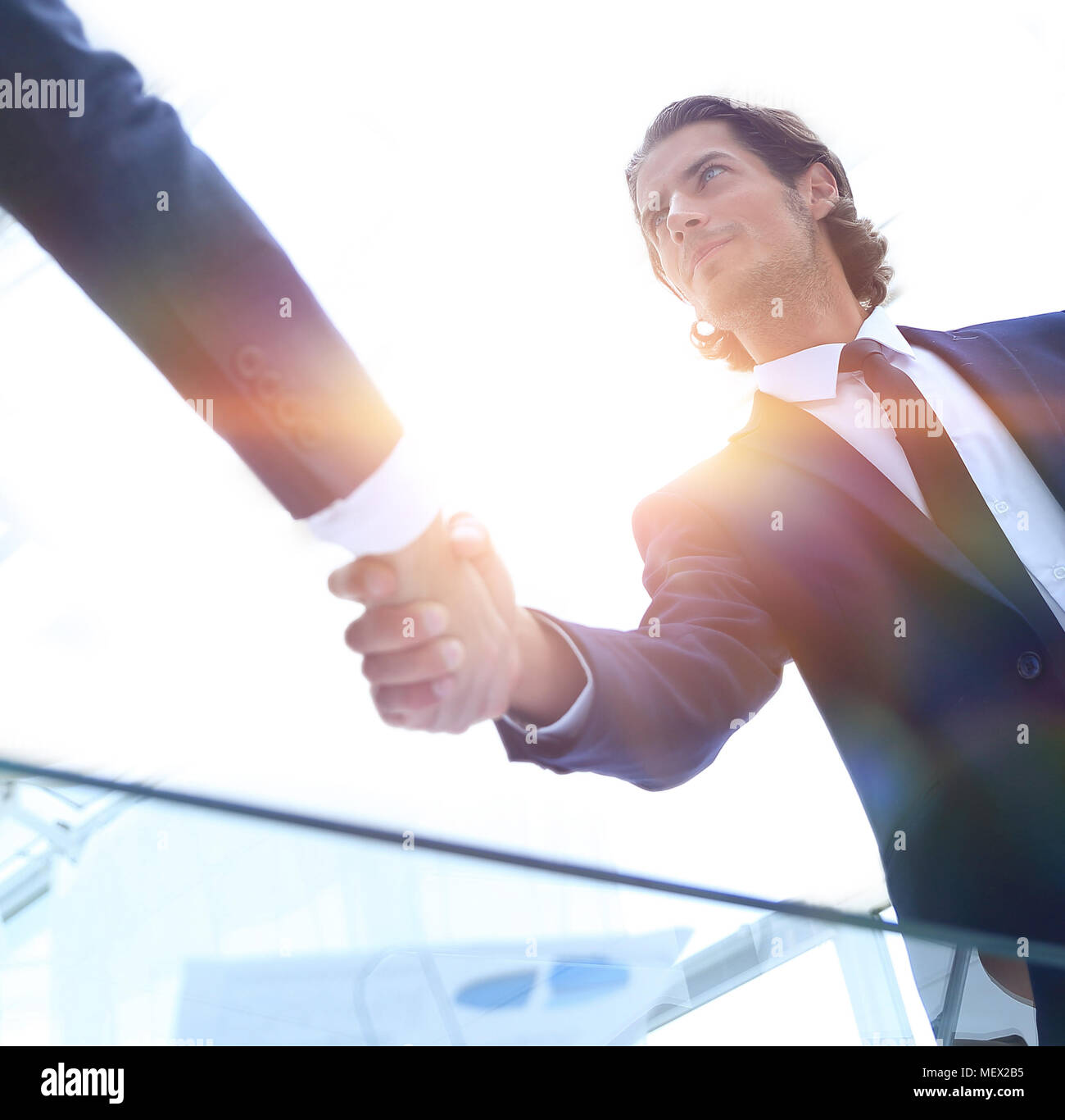 confident business people shaking hands Stock Photo - Alamy