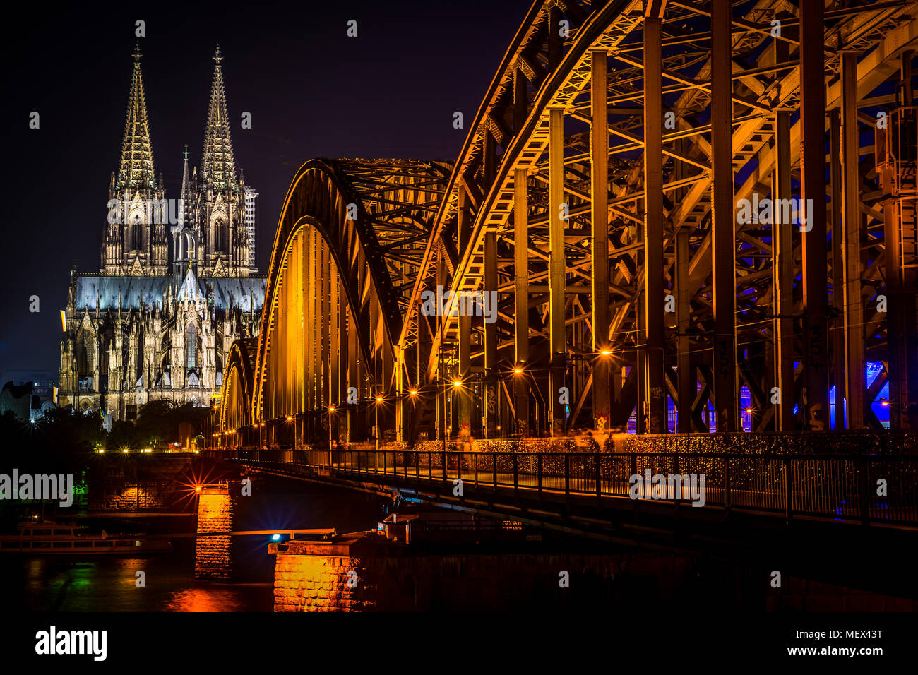 Nighttime at the Hohenzollern Bridge with Cologne Cathedral in Cologne ...