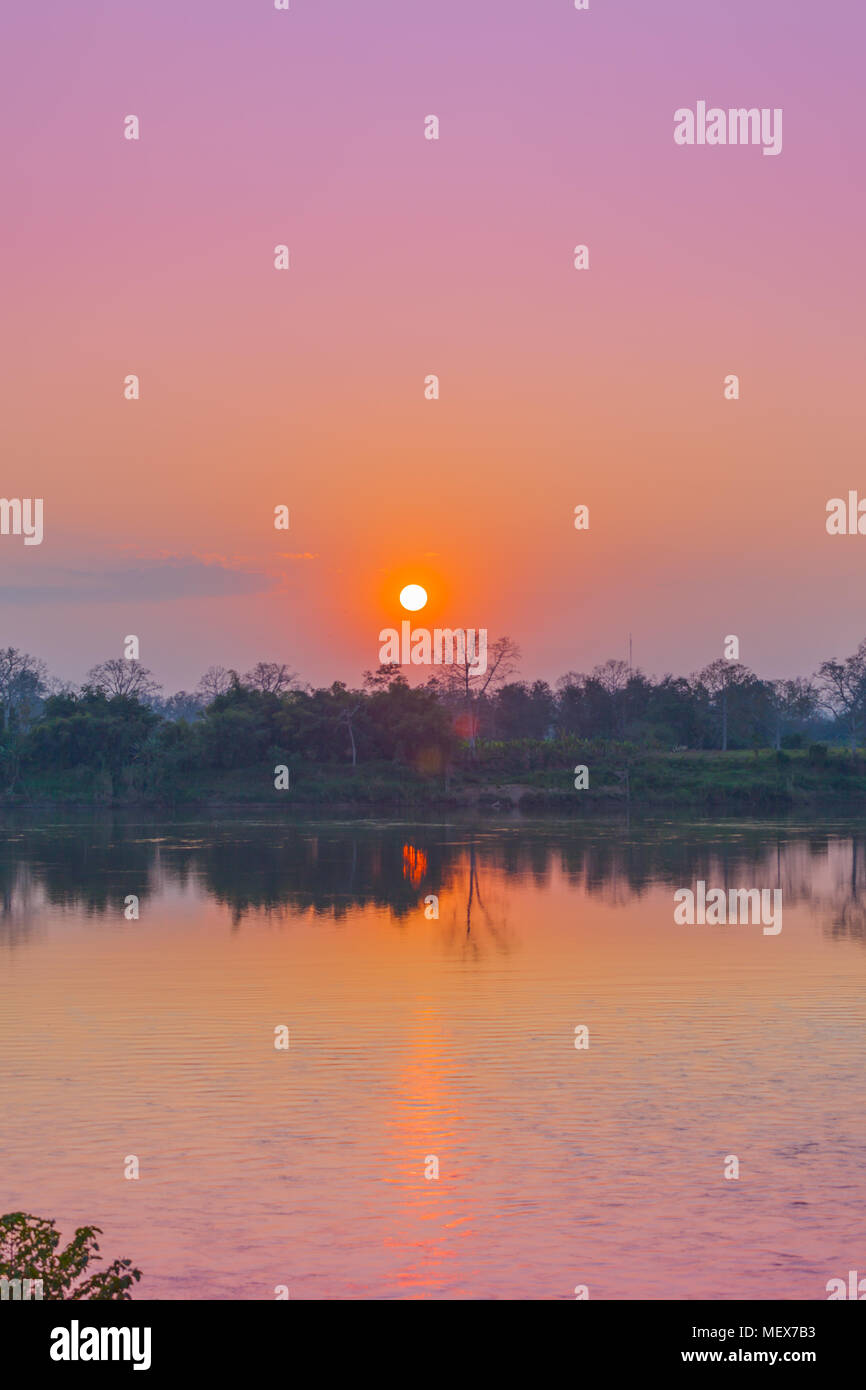 beautiful sunset above Kong river in Laos Stock Photo - Alamy