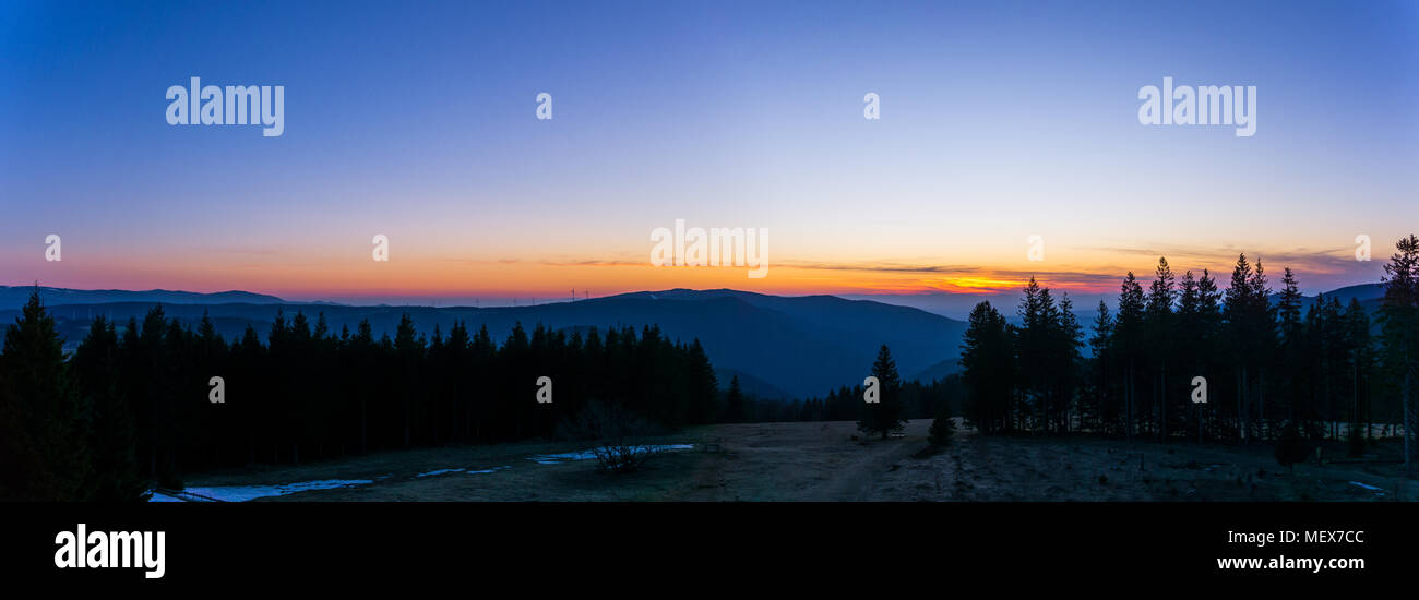 Germany, Colorful sky over black forest nature landscape after sunset ...