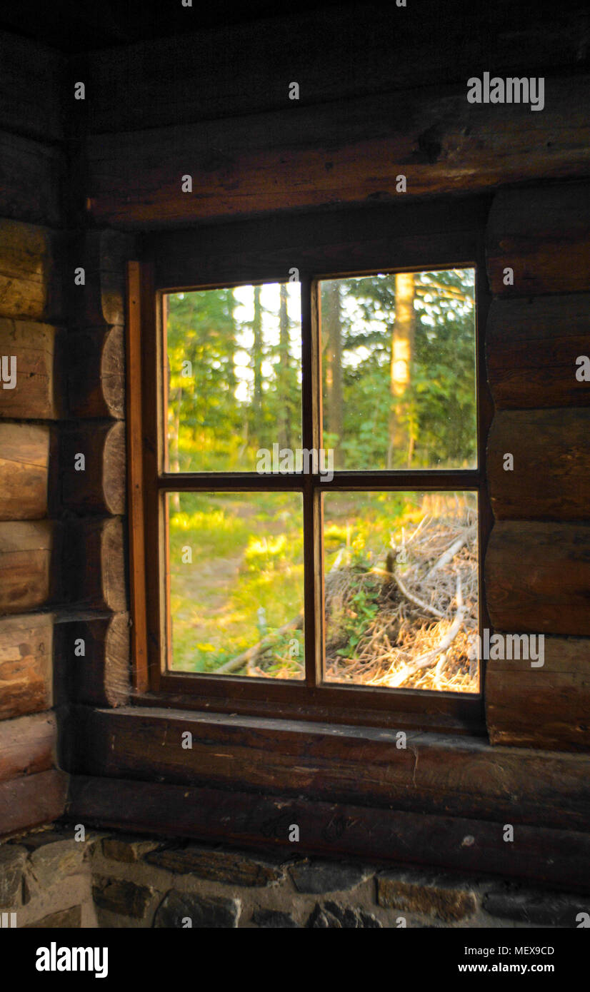 view through window of a wooden cabin Stock Photo - Alamy