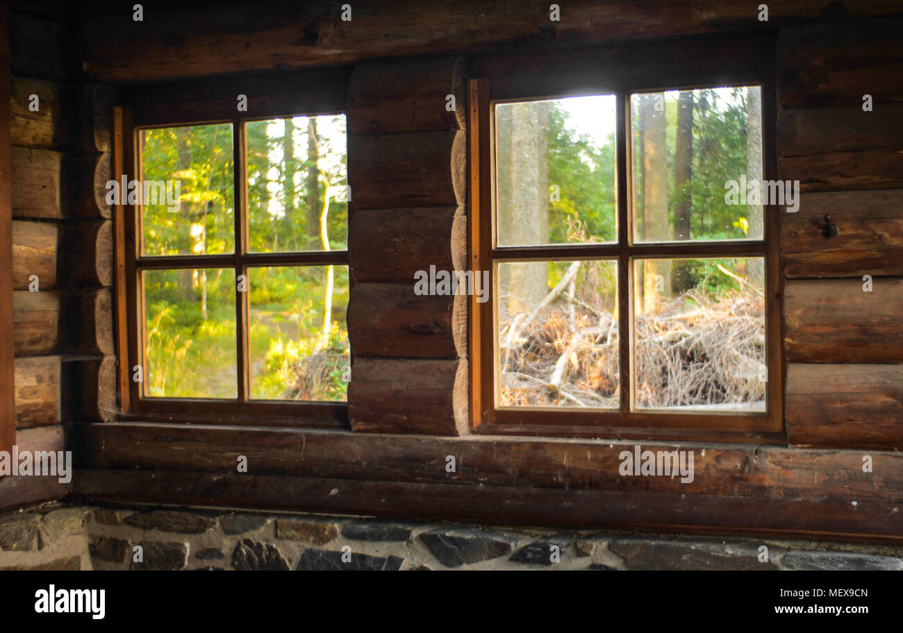 view through window of a wooden cabin Stock Photo - Alamy
