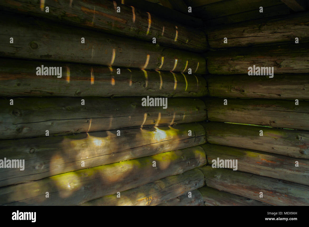 details of a wooden log wall on a simple wooden cabin Stock Photo - Alamy