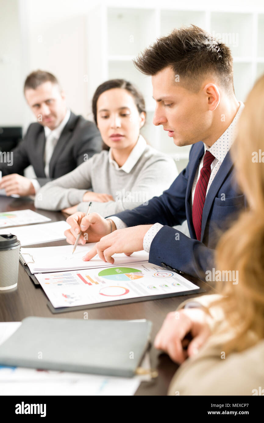 Young business leader running meeting Stock Photo - Alamy