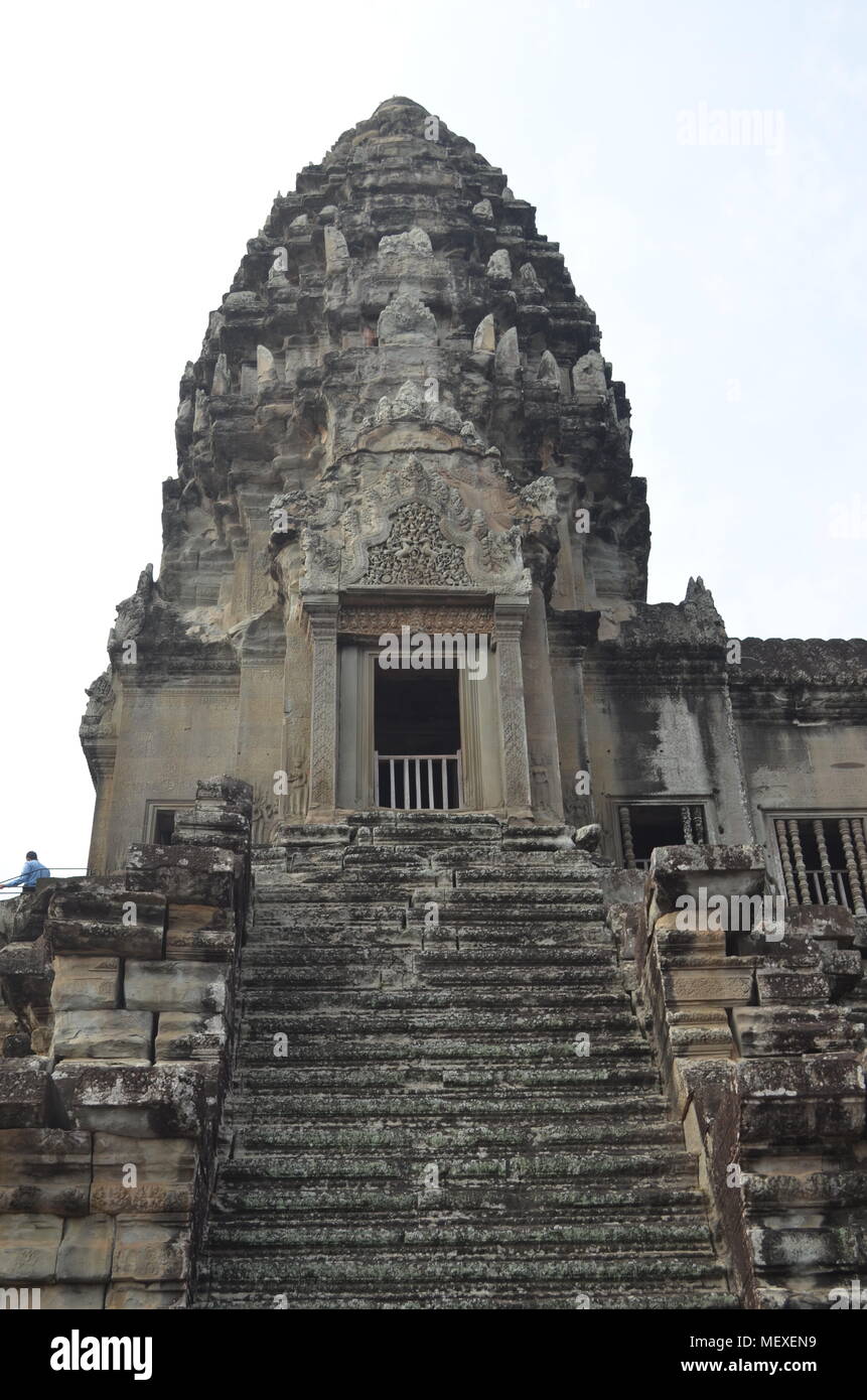 A domed temple with a staircase leading up to it at Angkor Wat Siem ...