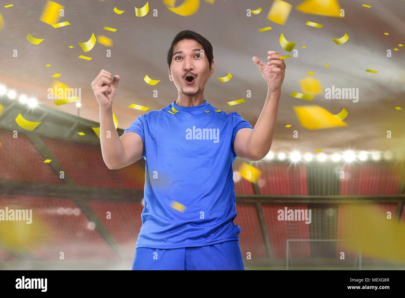 Excited football player cheering hi-res stock photography and images ...