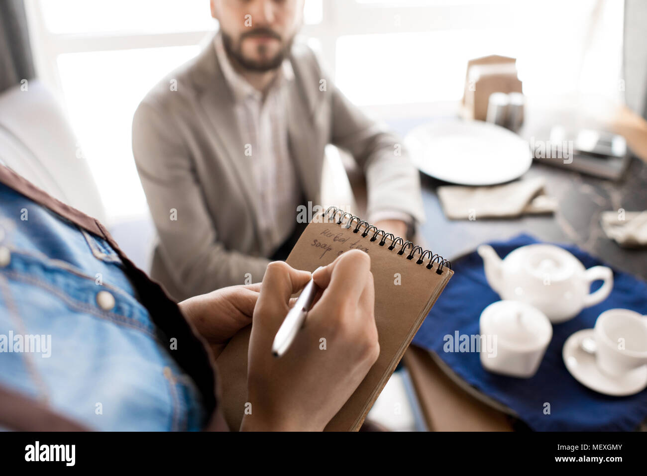 Taking order hi-res stock photography and images - Alamy