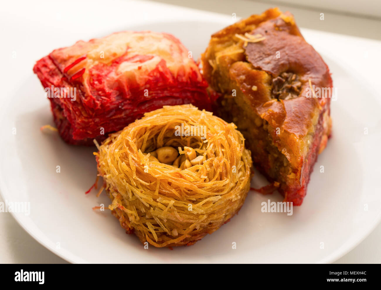 Baklava dessert on traditional plate hi-res stock photography and ...