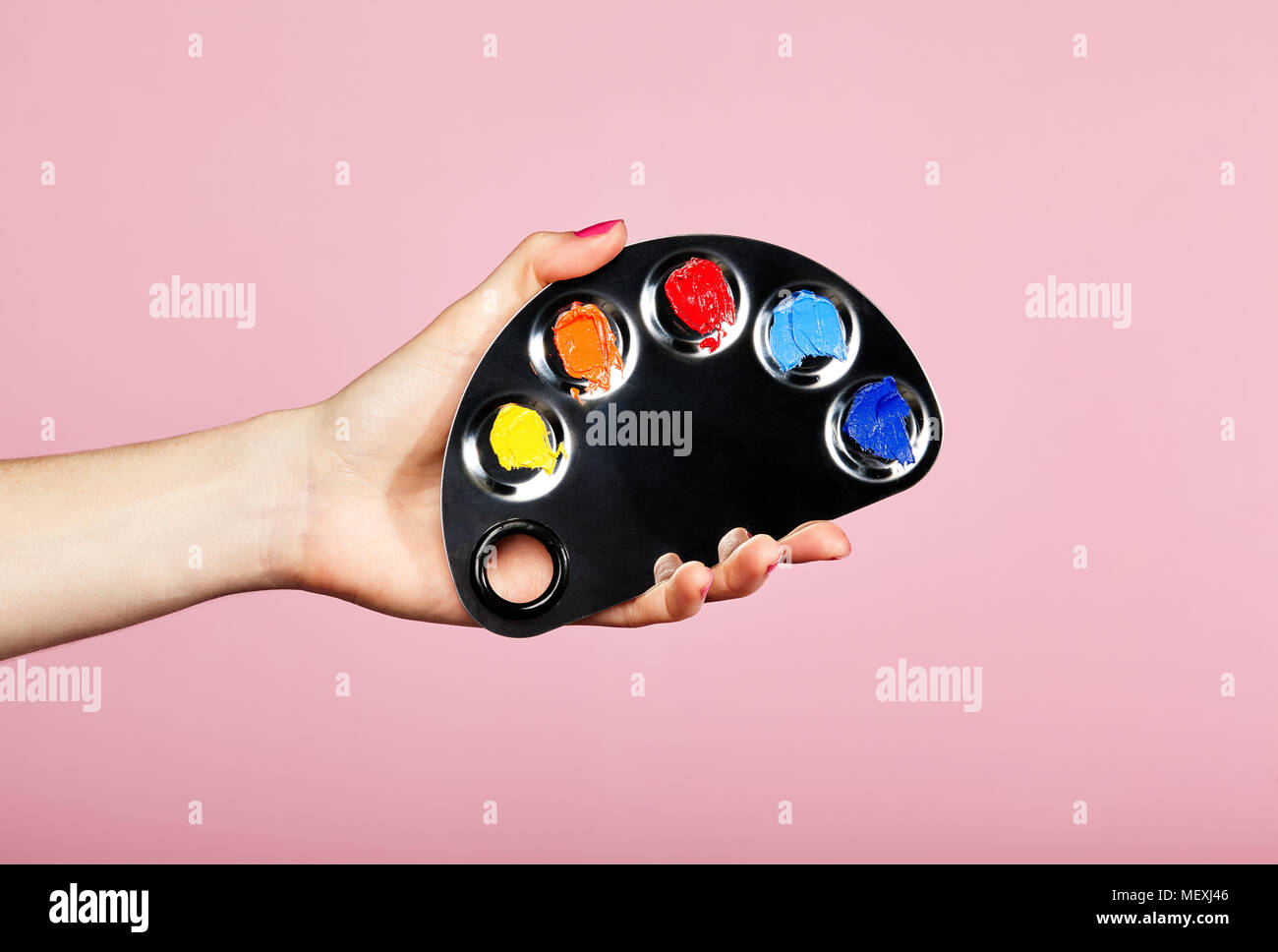 Artist's palette close-up. A palette of colors for painting makeup ...