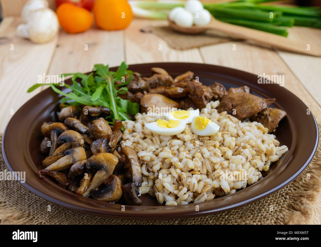 Barley porridge, fried mushrooms and duck liver, boiled quail eggs ...