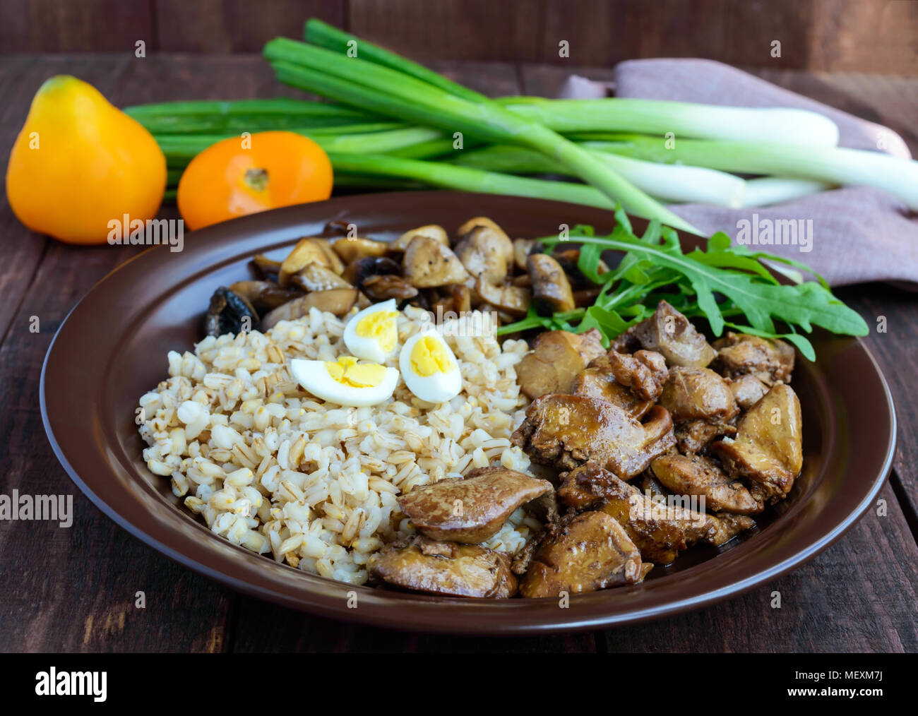 Barley porridge, fried mushrooms and duck liver, boiled quail eggs ...