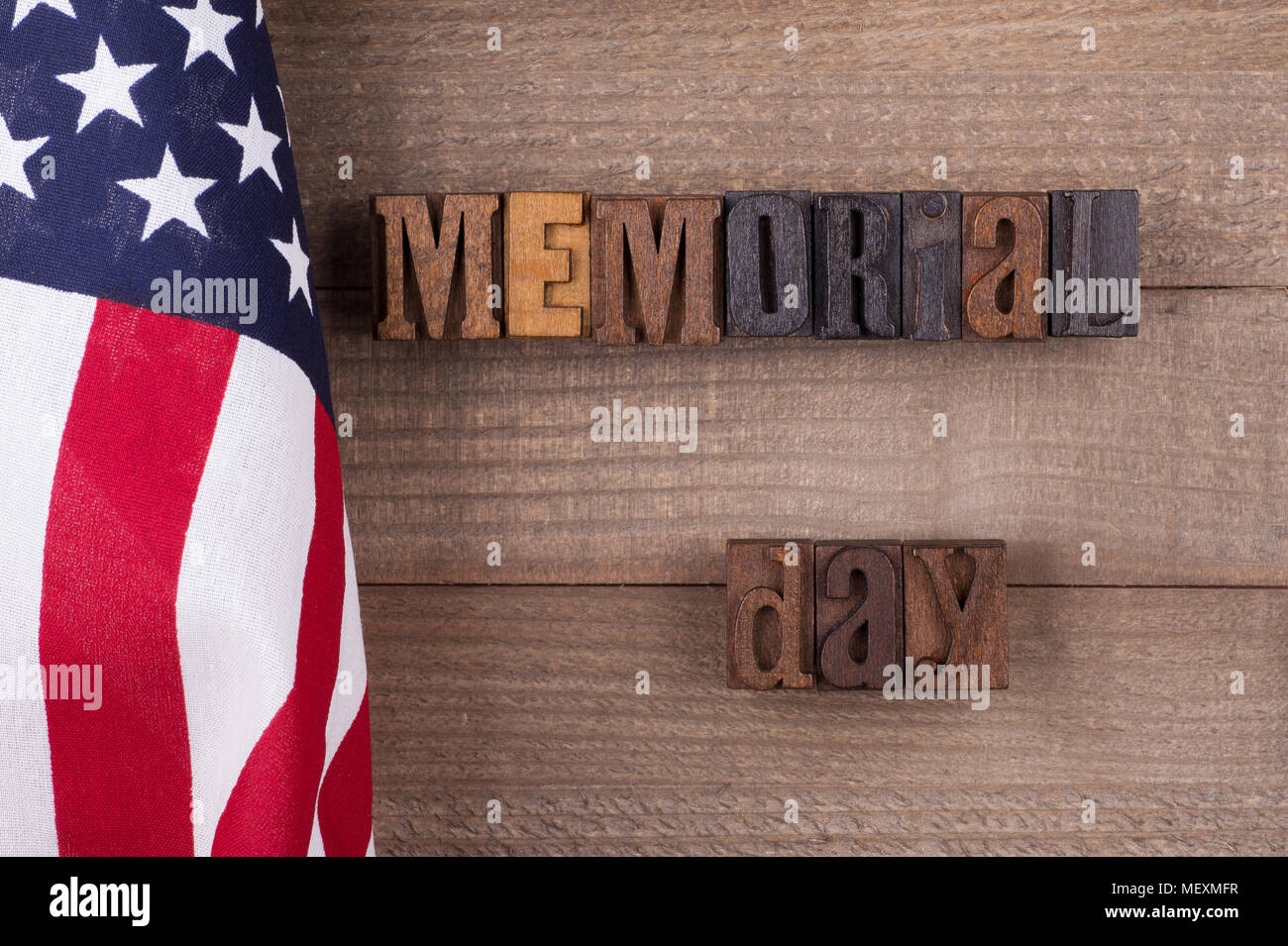 Memorial Day banner with American flag on a rustic wooden background ...