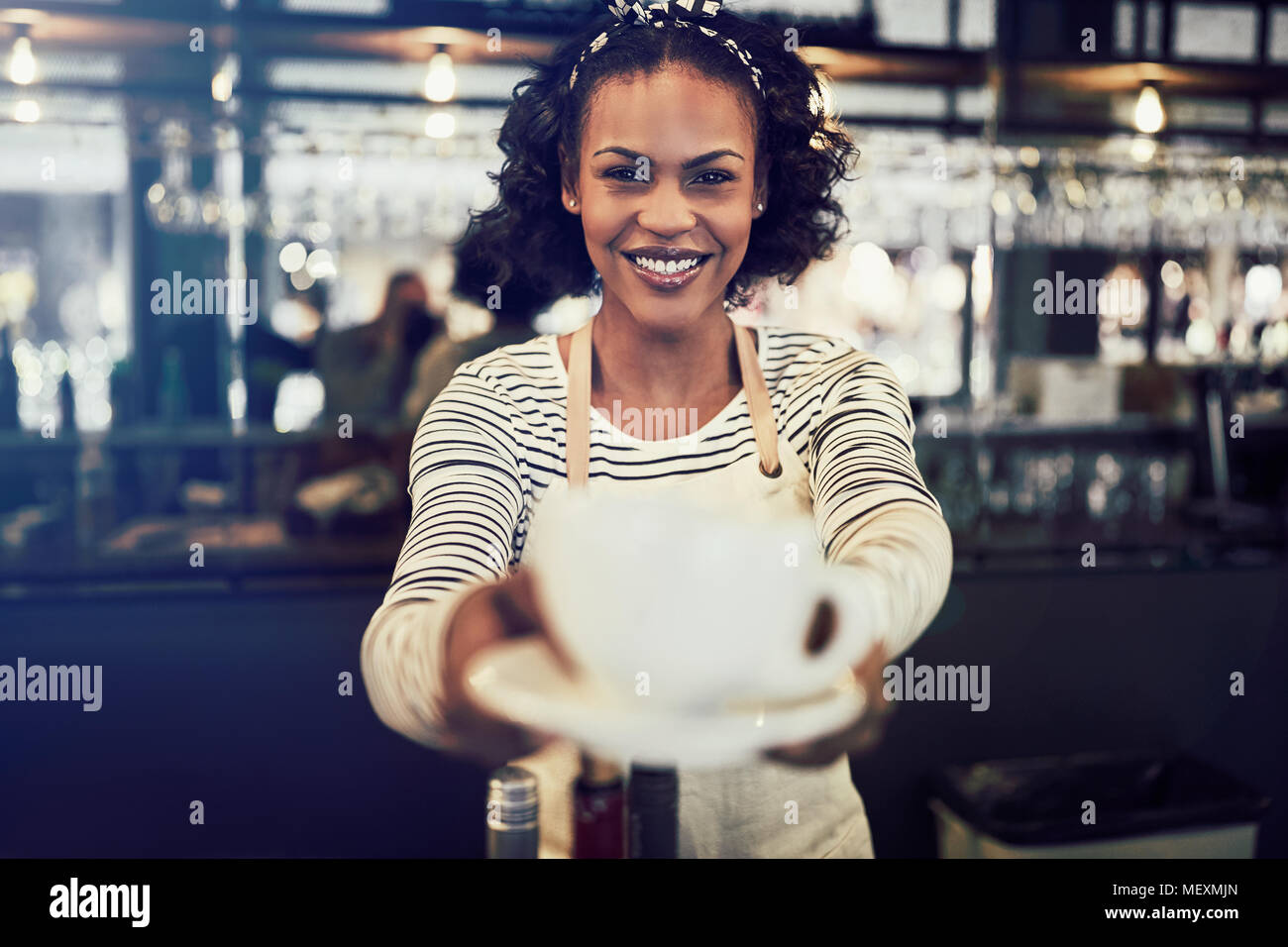 Barista behind counter coffee shop hi-res stock photography and images ...