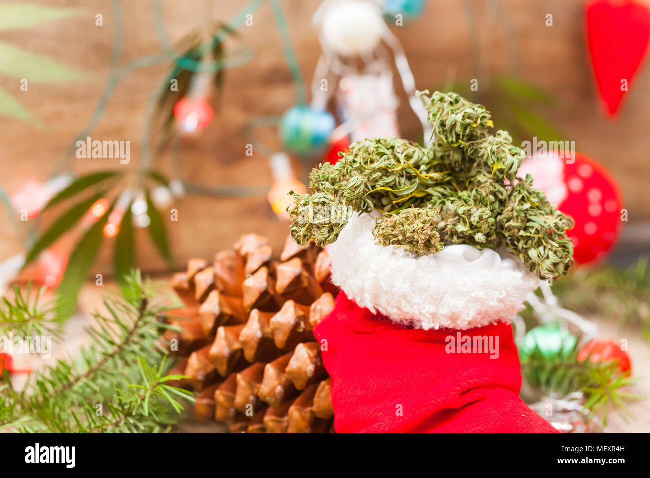 santa red Christmas boot with marijuana Stock Photo - Alamy