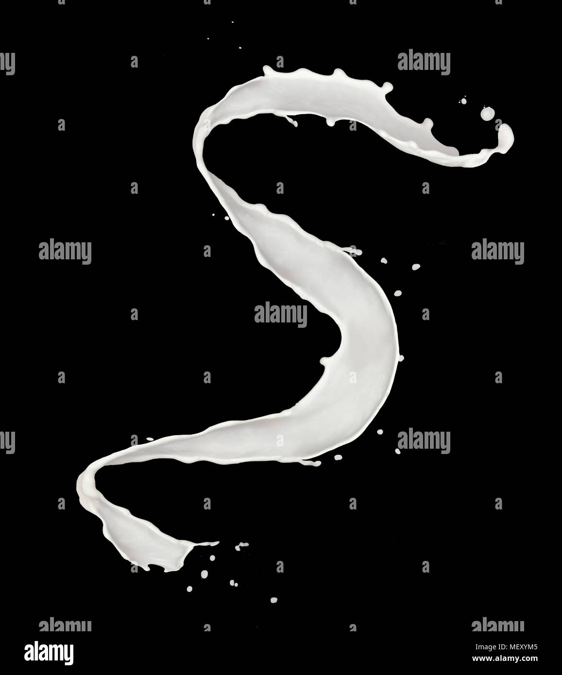 Abstract splash of milk isolated on black background. High resolution ...