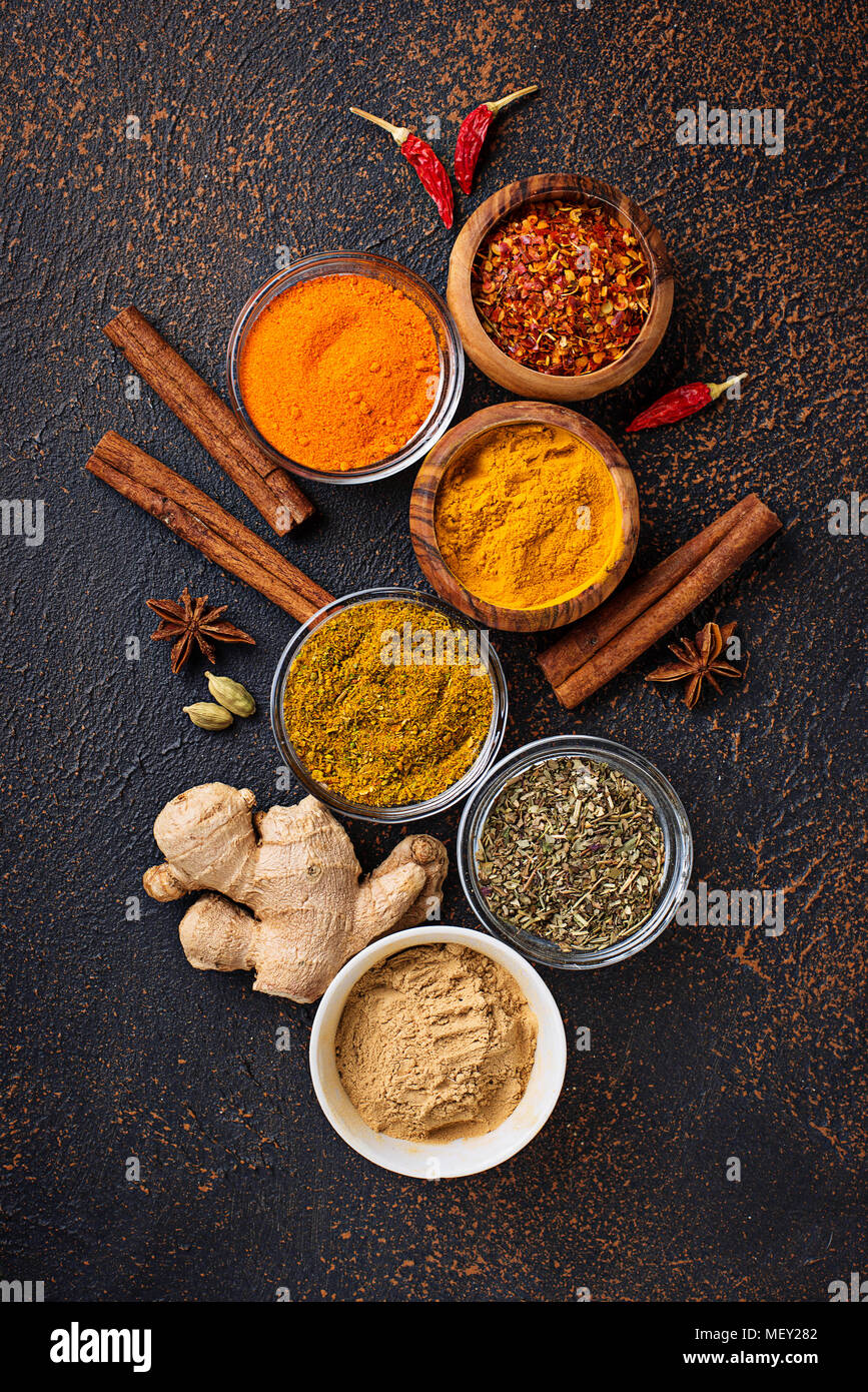 Traditional Indian spices on rusty background Stock Photo - Alamy