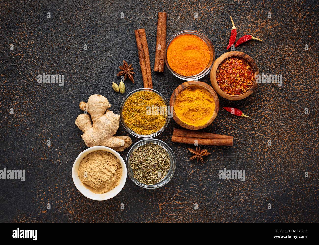Traditional Indian spices on rusty background Stock Photo - Alamy