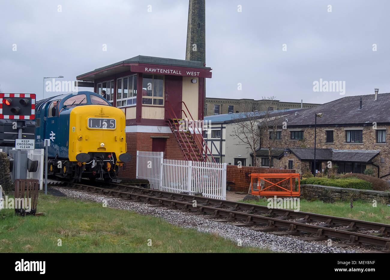 Diesel engine pulls passenger train Stock Photo - Alamy