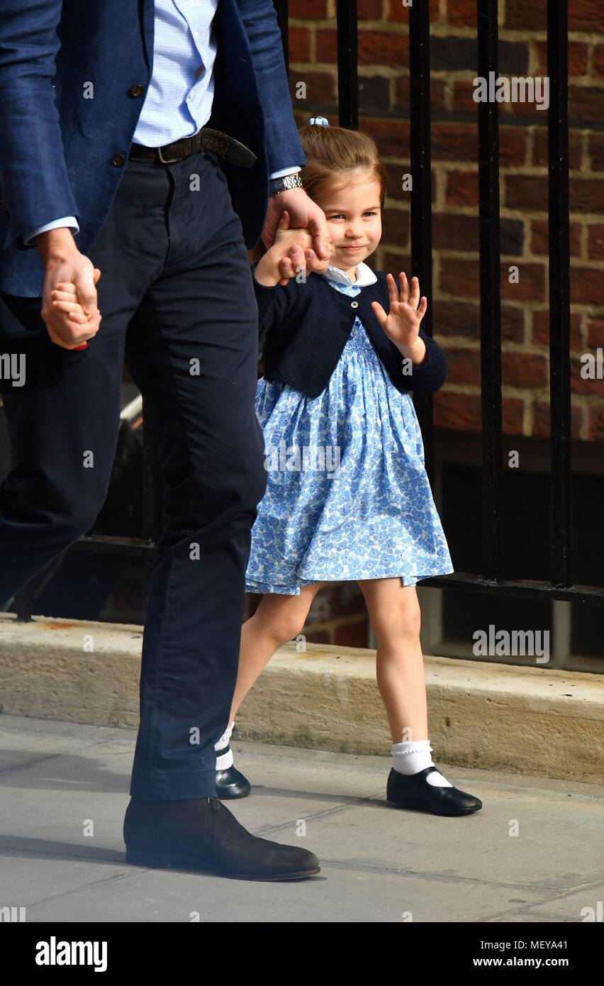 Princess Charlotte holds her fathers hand as she arrives to meet her ...