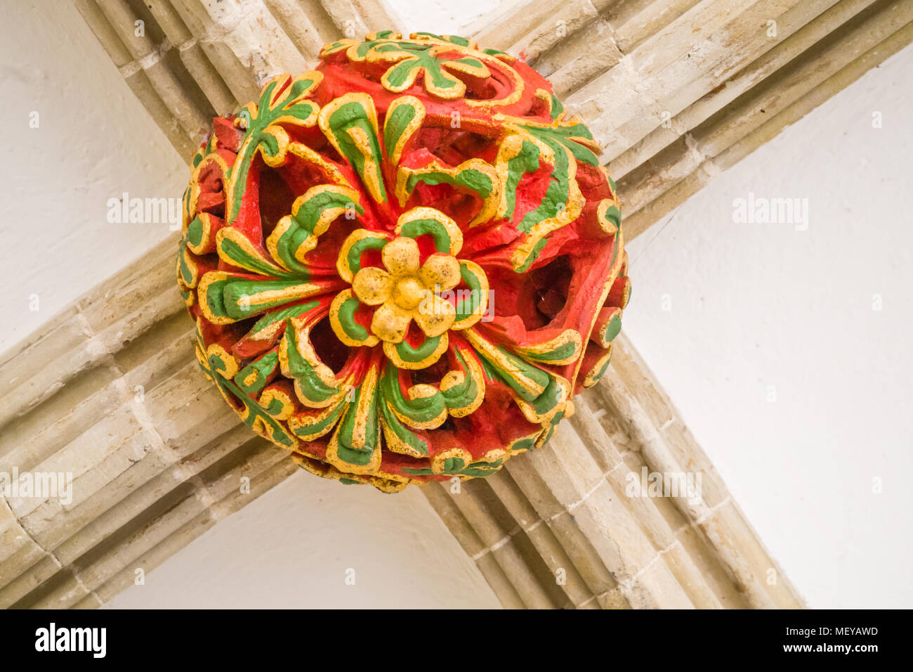 Painted ceiling boss on the corridor of the cloister at the medieval ...