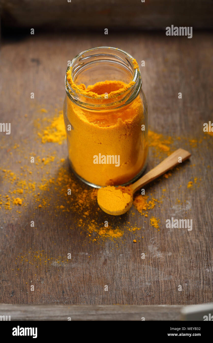 Indian turmeric powder in jar, curry Stock Photo - Alamy