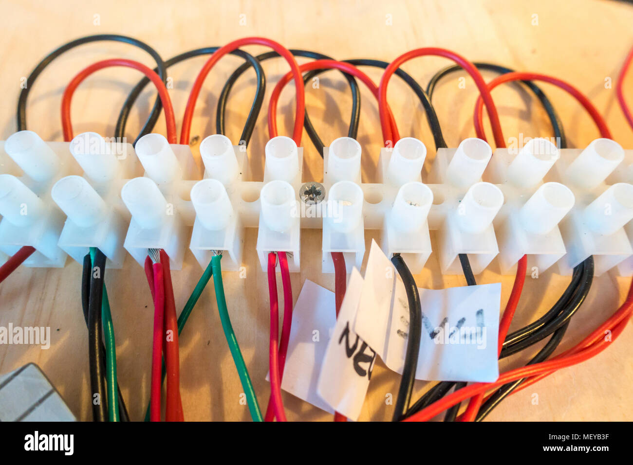A terminal strip with lots of connected wires Stock Photo - Alamy