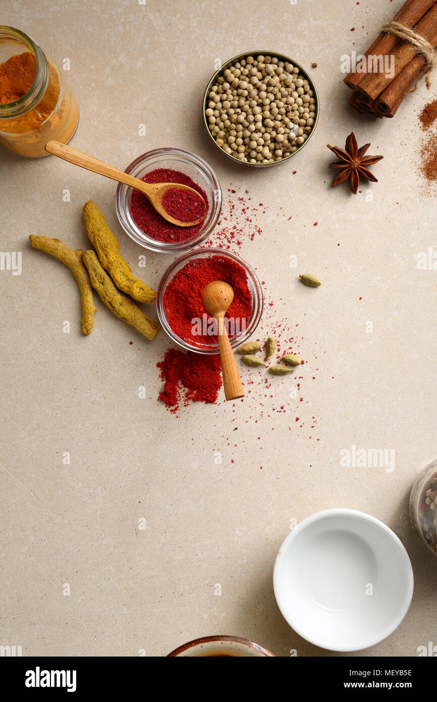 Various spice on concrete, food top view Stock Photo - Alamy