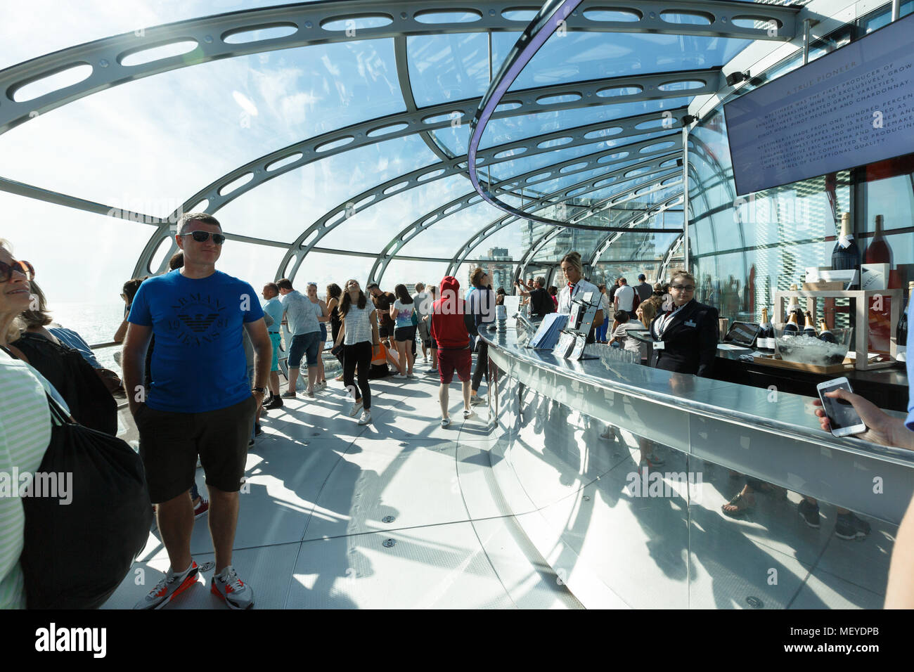 visitors enjoy the view of Brighton coastline from a bird's-eye view ...