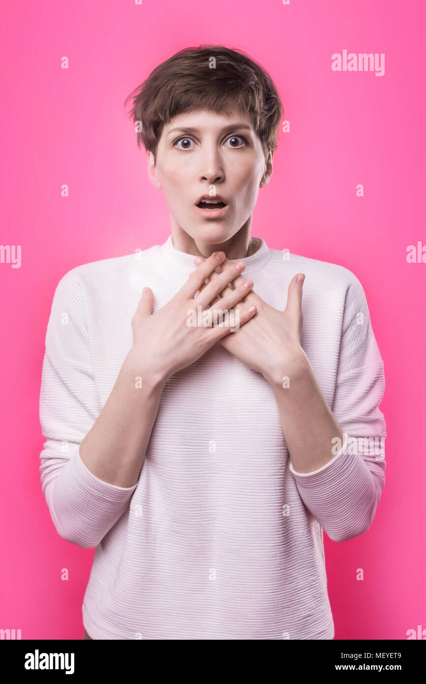 Wow. Beautiful female half-length front portrait isolated on pink ...