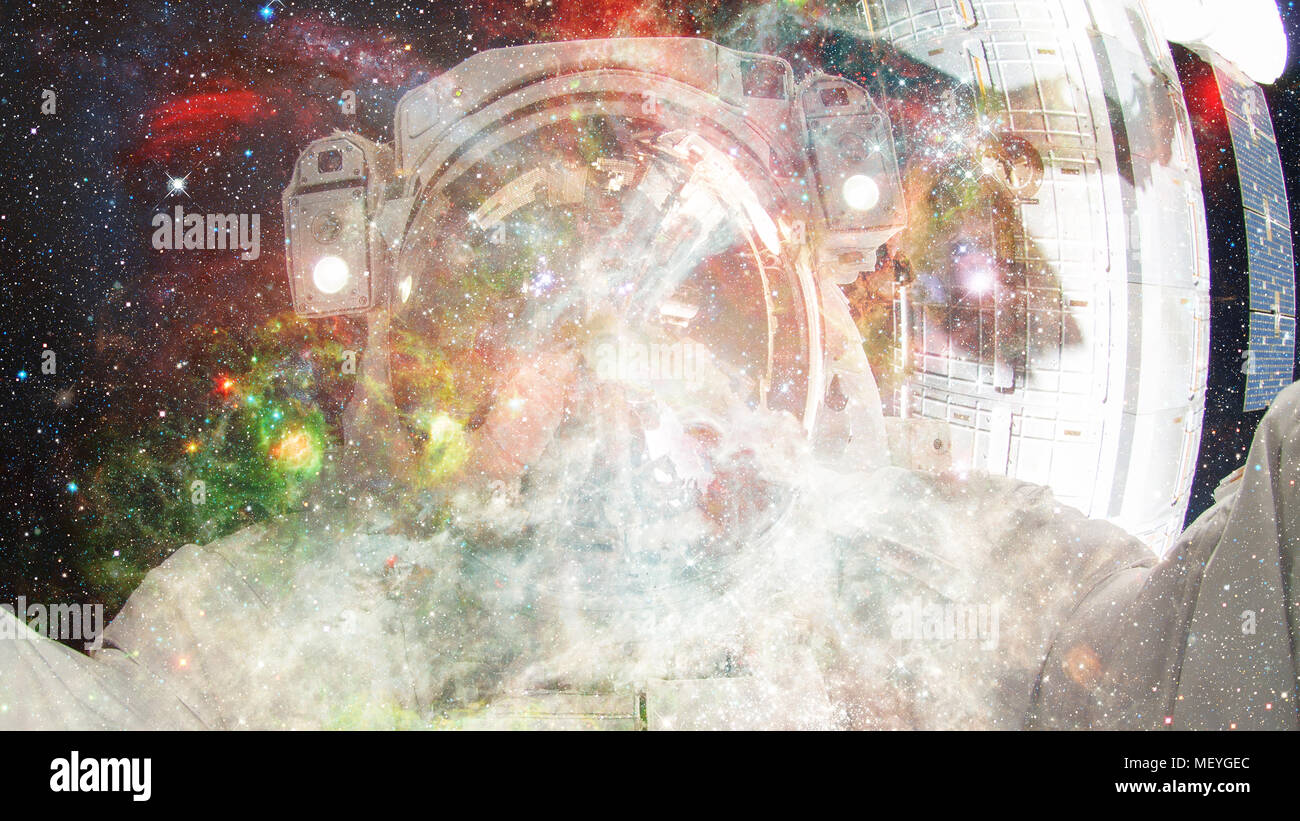 Astronaut in outer space. Science fiction art. Elements of this image ...