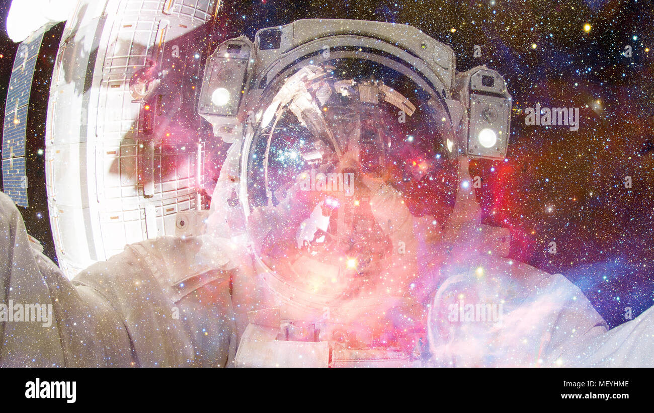 Astronaut in outer space. Science fiction art. Elements of this image ...