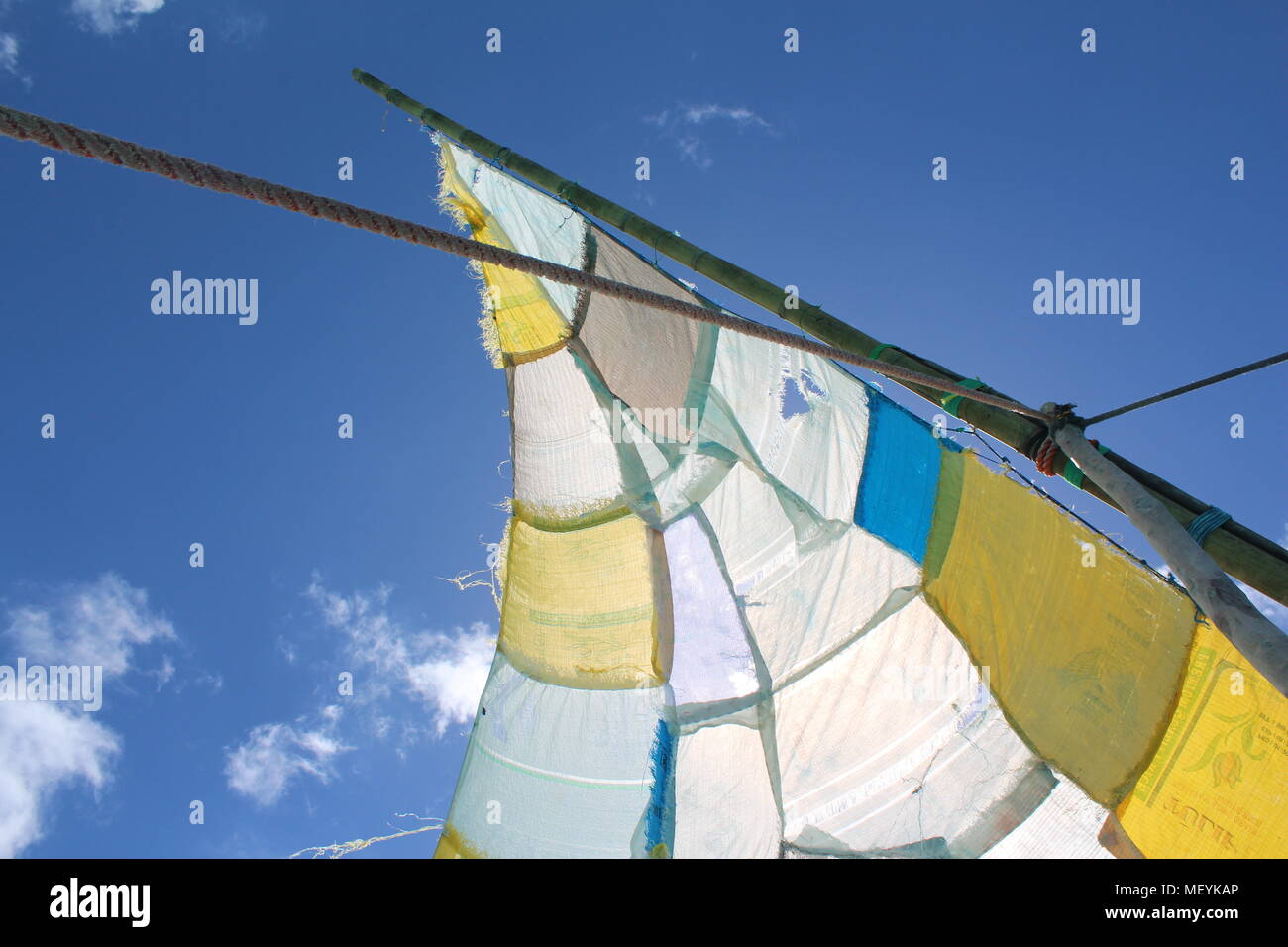 Colorful homemade sail. Patchwork sail made reusing flour and sugar ...