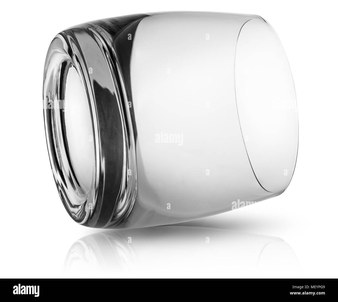 Glass for strong alcohol lying Stock Photo - Alamy