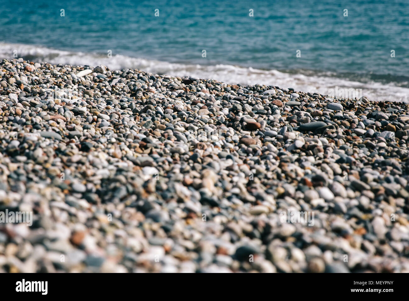 Detail of the cobble stone beach and sea Stock Photo - Alamy