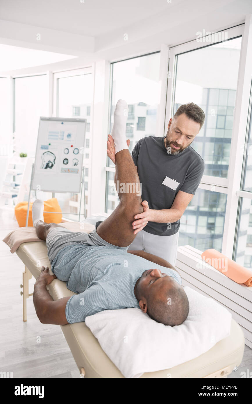 Lifting up leg hi-res stock photography and images - Alamy