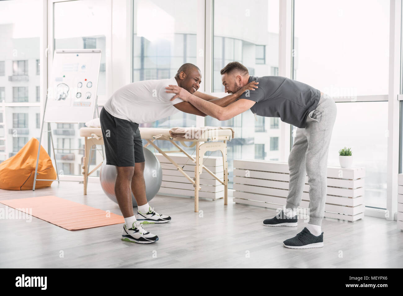 Bending trainer hi-res stock photography and images - Alamy