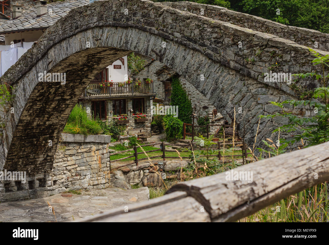 the bridge made of donkey back characteristic of an alpine village in ...