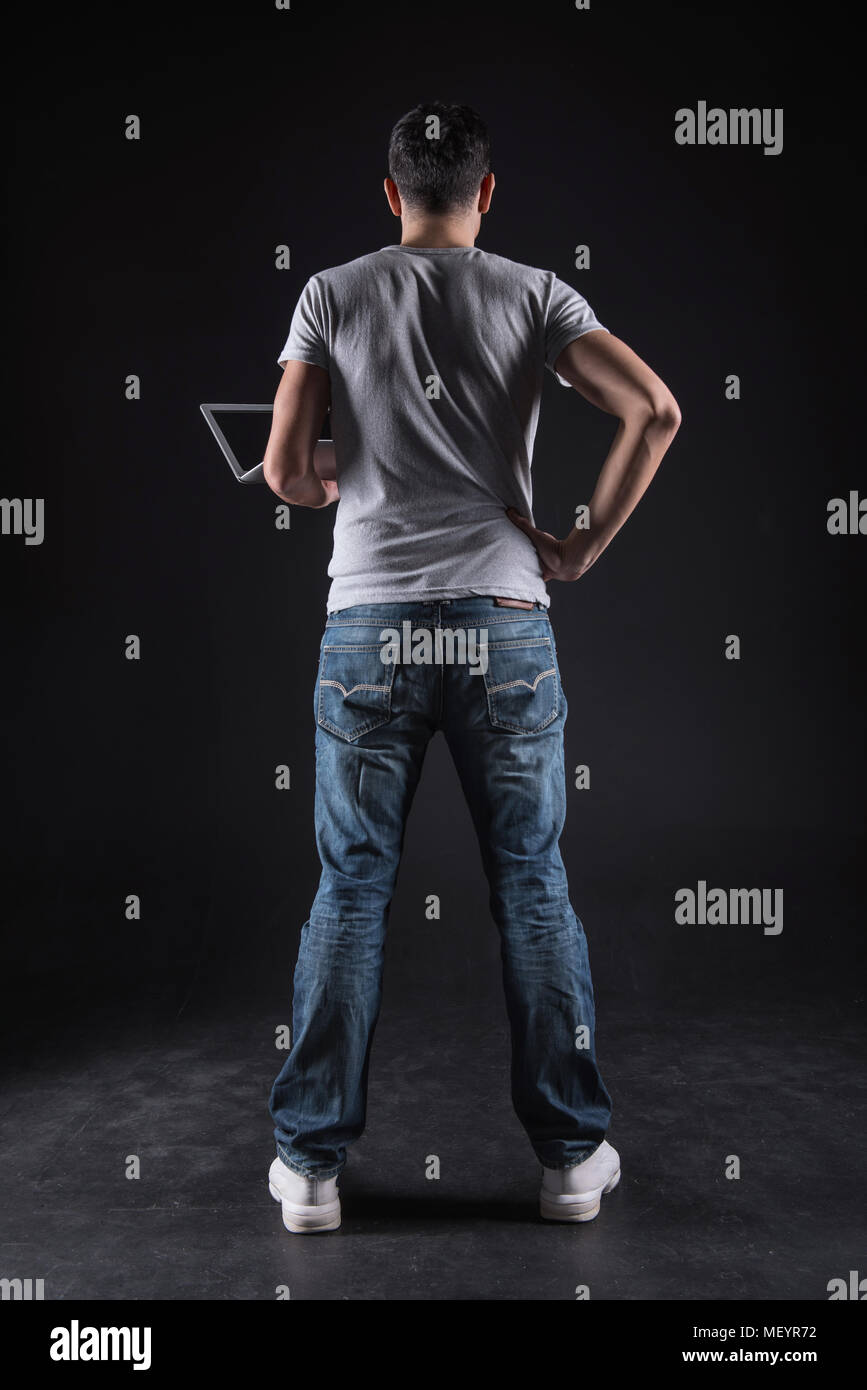 Confident pleasant man looking in front of him Stock Photo - Alamy