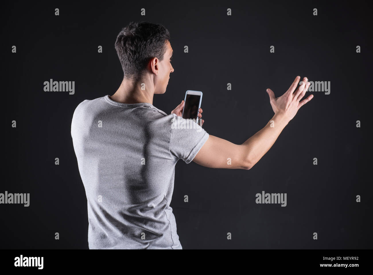 Smart handsome man using a mobile phone Stock Photo - Alamy