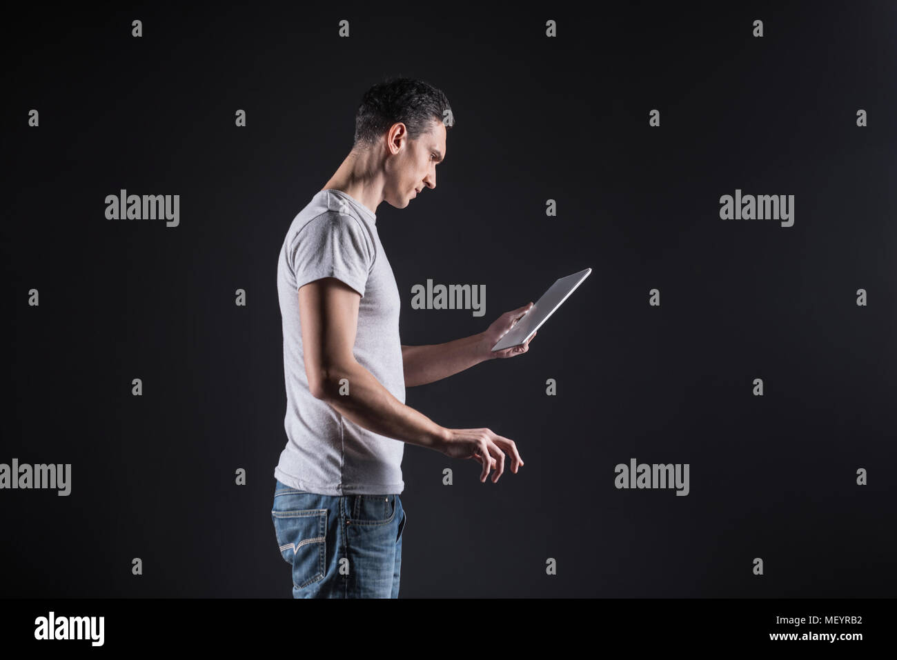 Nice smart man looking at the text Stock Photo - Alamy