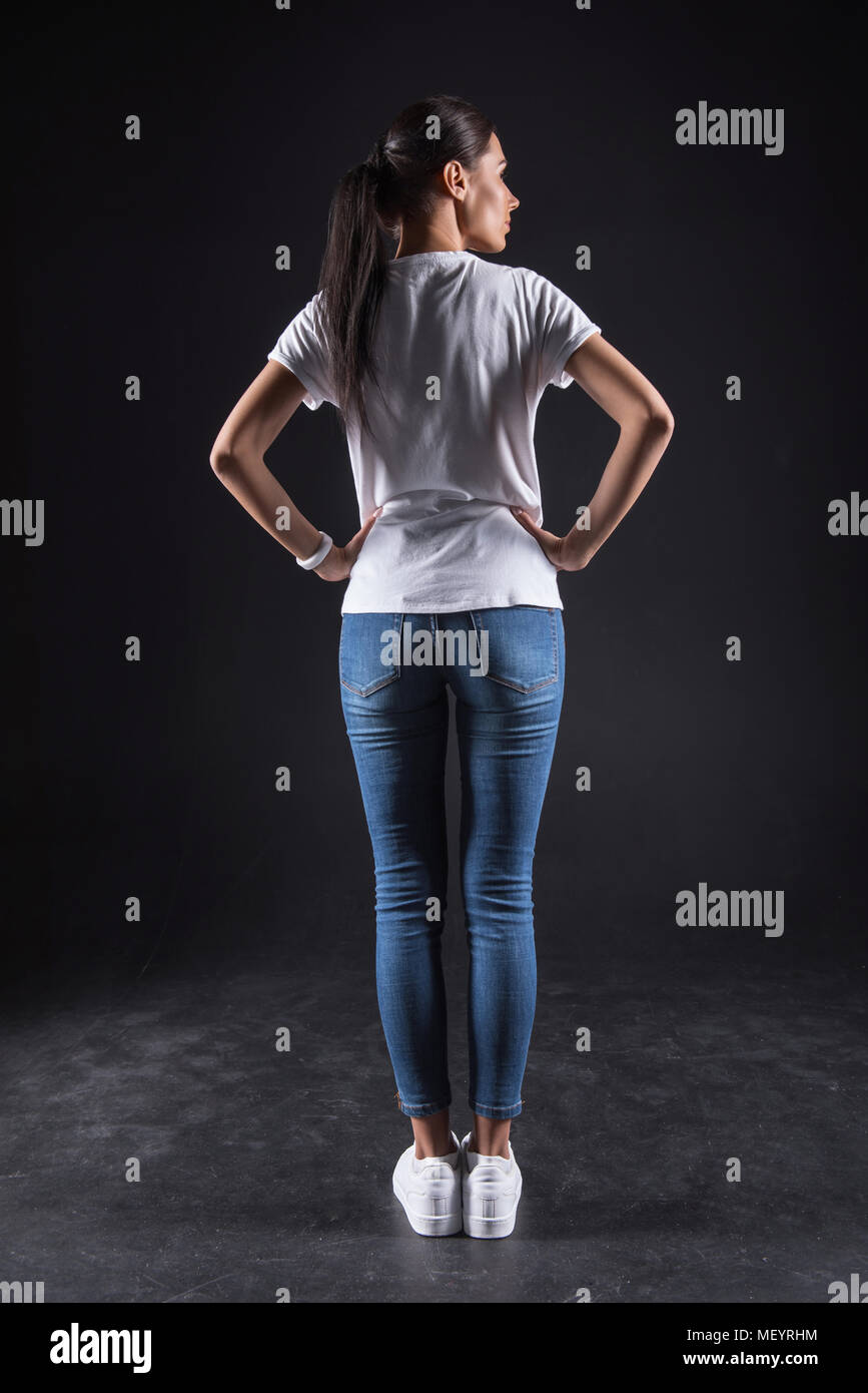 Pleasant smart woman turning her head Stock Photo - Alamy