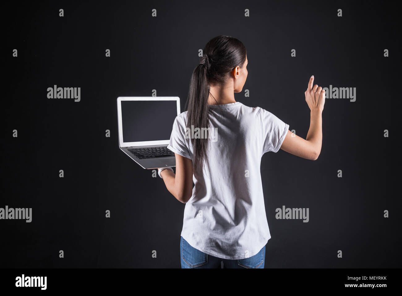 Smart confident woman pressing on the sensory screen Stock Photo - Alamy